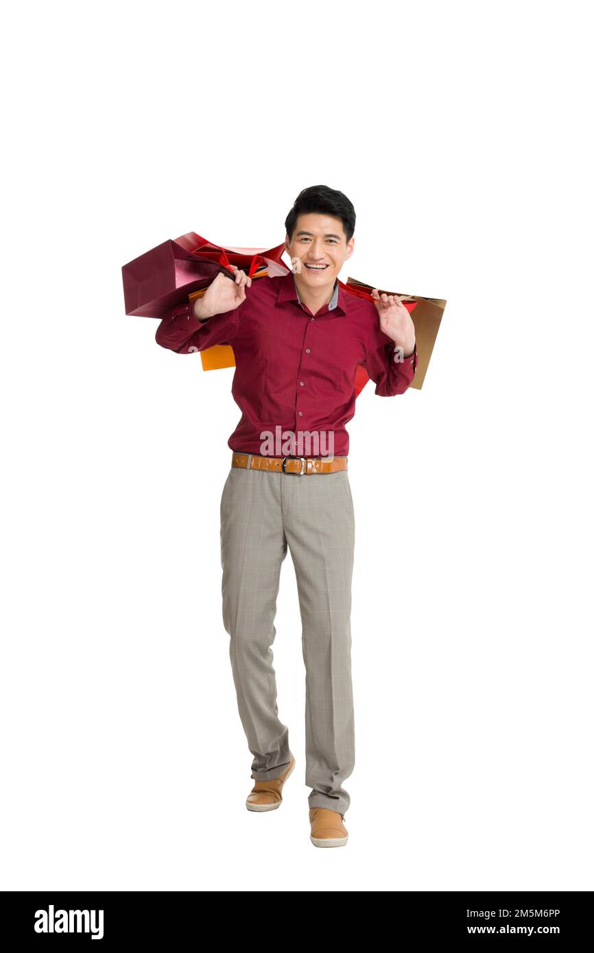 Chinese man carrying shopping bags hi-res stock photography and images ...