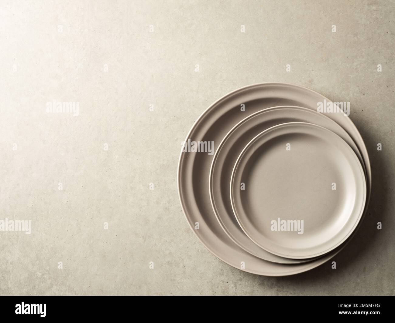 gray plate by size Stock Photo - Alamy
