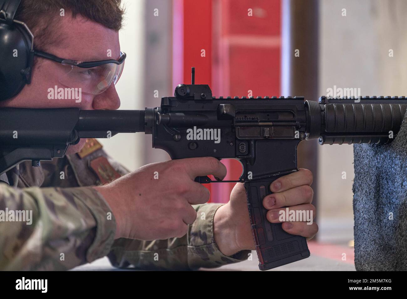 A U.S. Air Force Airman fires a weapon during a competition at Kapaun ...