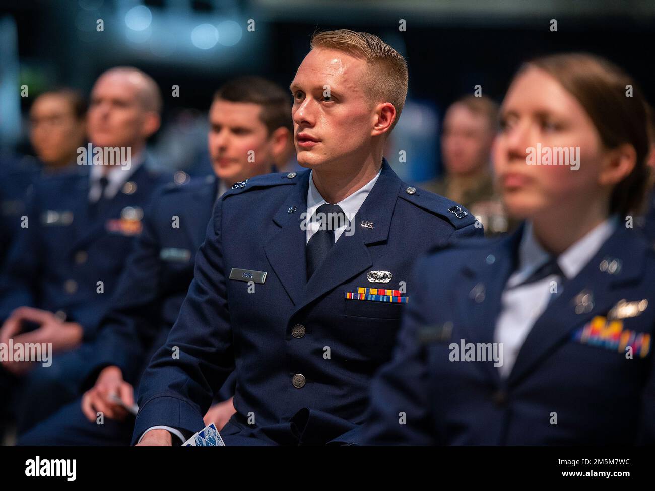 Capt. Charles Carr listens with his classmates as Secretary of the Air ...