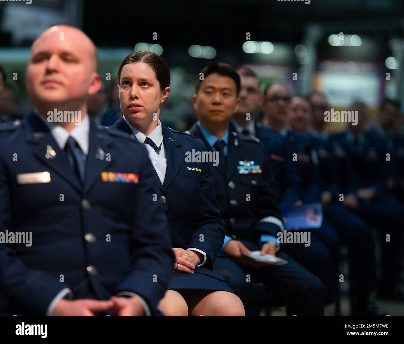 Graduates listen as Secretary of the Air Force Frank Kendall speaks at ...
