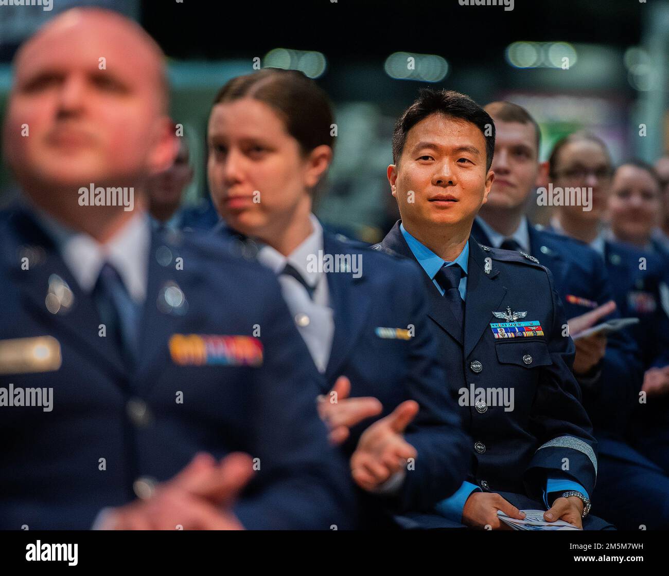 Republic of Korea Air Force Maj. Hongseok Kim listens with his ...