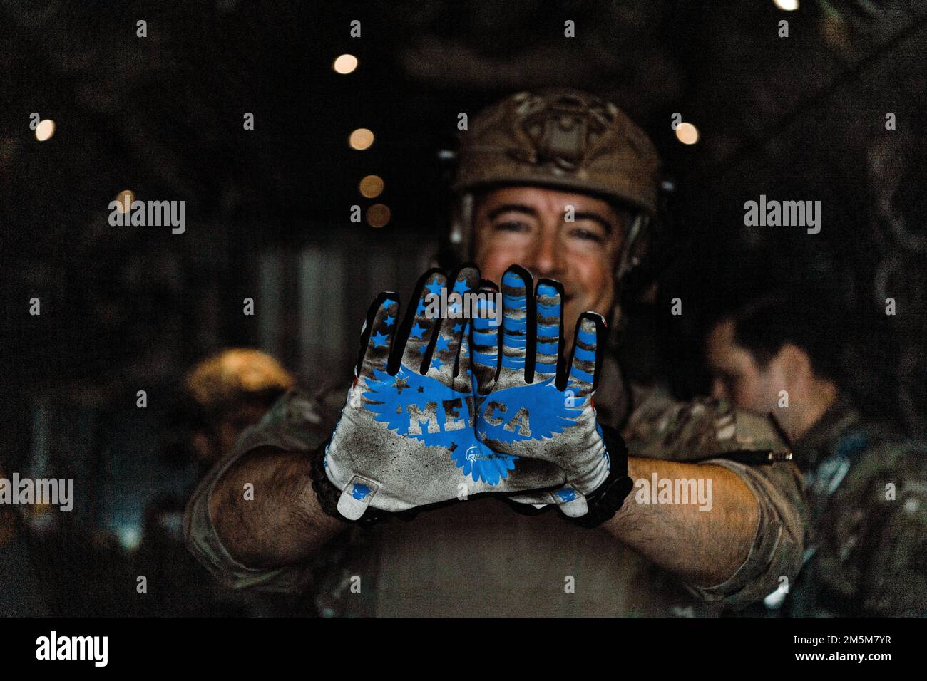 A 23d Wing HC-130J Combat King II loadmaster poses for a photo, Moody ...
