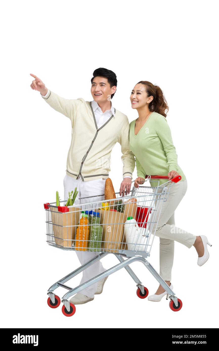 Take young lovers push cart shopping Stock Photo - Alamy