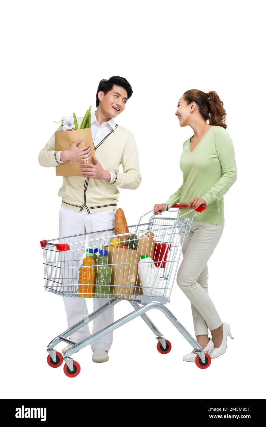 Take young lovers push cart shopping Stock Photo - Alamy