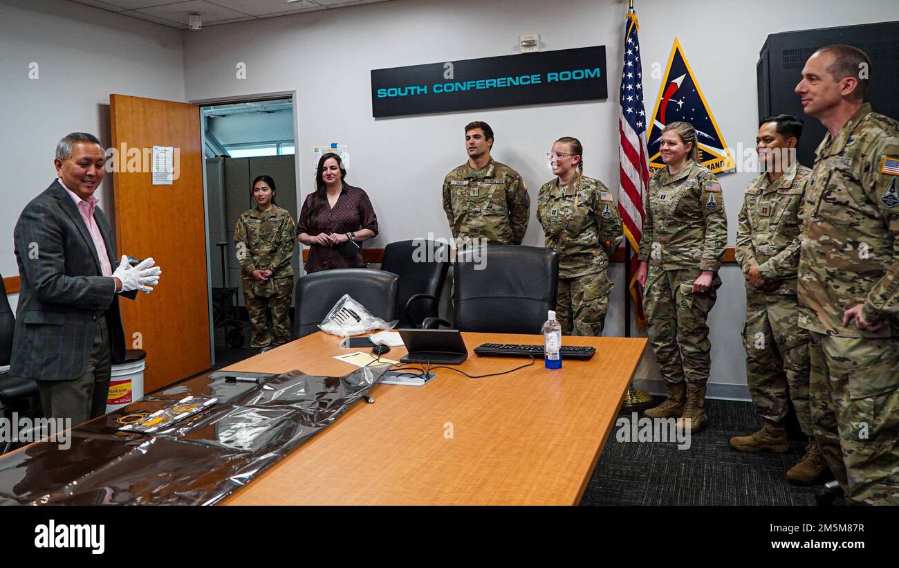 Cordell DeLaPena (left), Program Executive Officer, Space Production ...