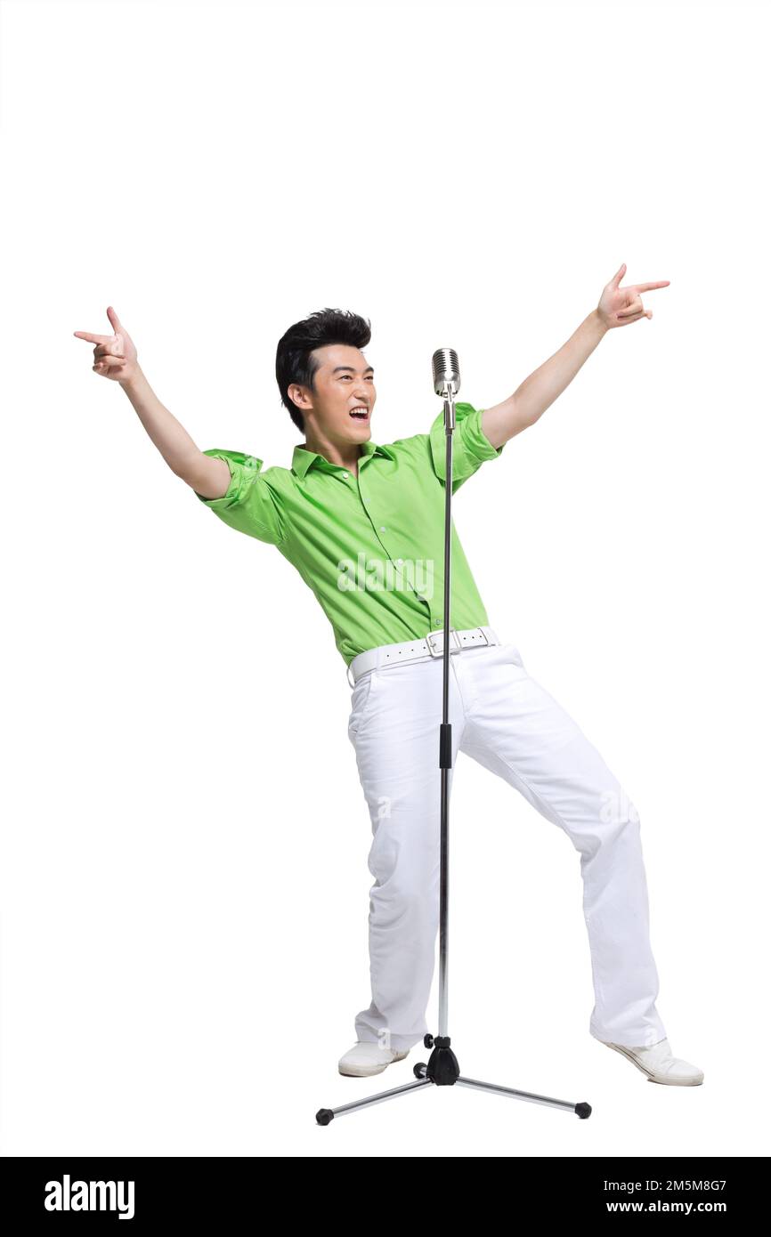 Man singing while holding a microphone Cut Out Stock Images & Pictures ... Man singing while holding a microphone Cut Out Stock Images & Pictures ...