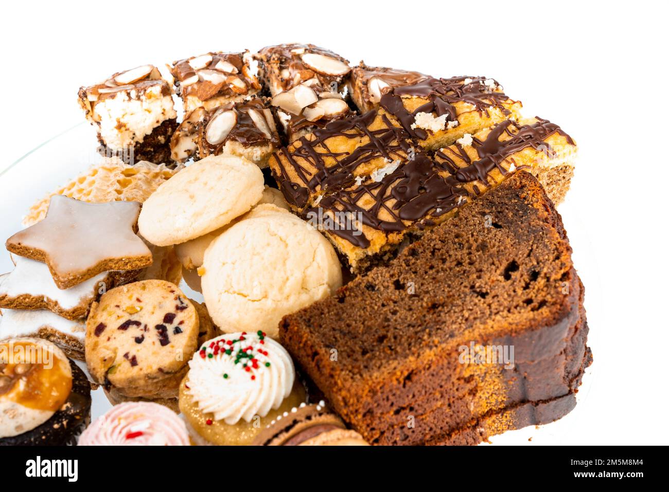 Collection of sweet treats on a white background Stock Photo - Alamy