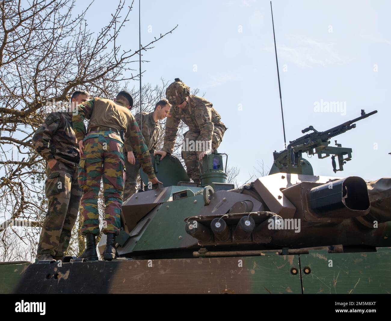 A Belgian Soldier educates U.S. and French Soldiers about the design of ...