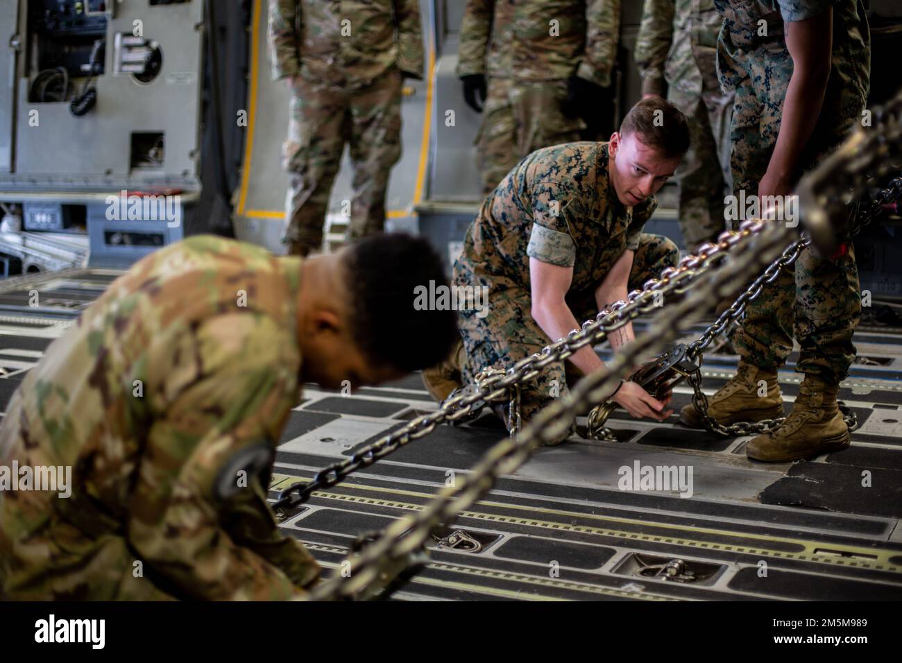 U.S Airman 1st Class Isaiah Johnson (left), a loadmaster with 16th ...