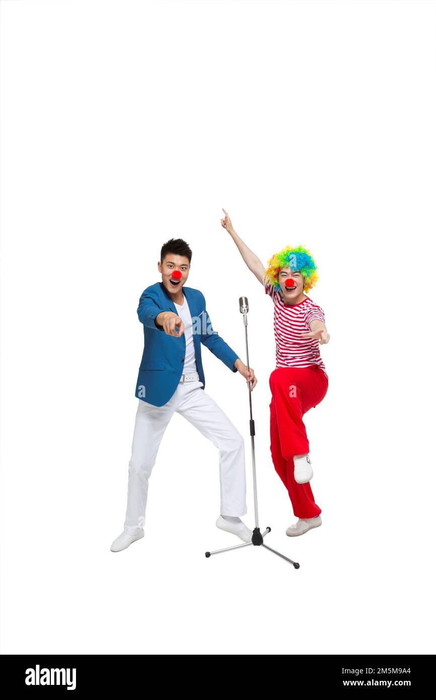 Vogue vitality youth and clown singing Stock Photo - Alamy