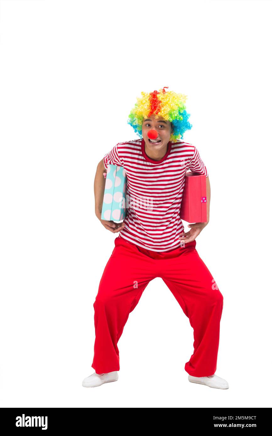 Shed film happy funny clown, gift box Stock Photo - Alamy