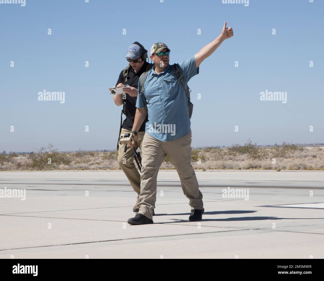 Preston Wallace, operations test engineer (front), and Nik Sak, test ...