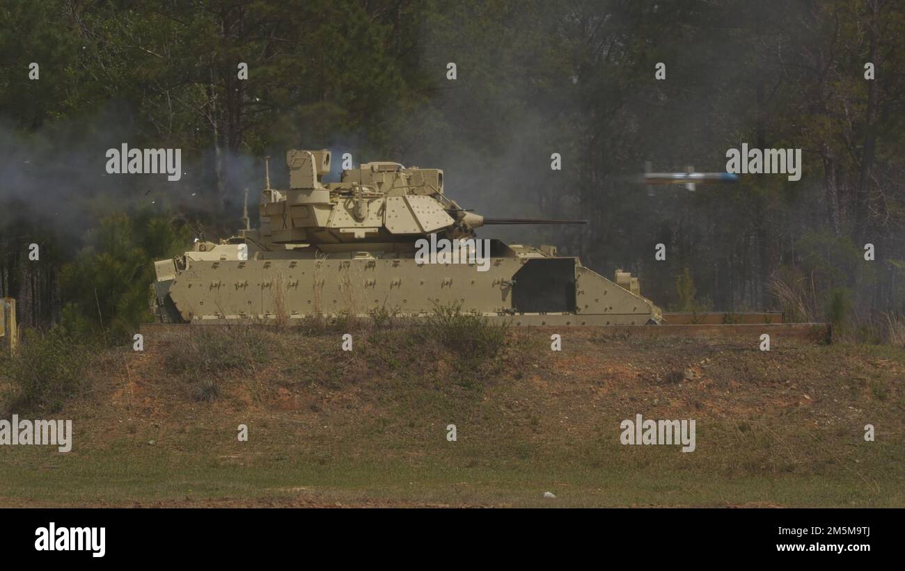 A Bradley Infantry Fighting Vehicle fires a TOW anti-tank guided ...