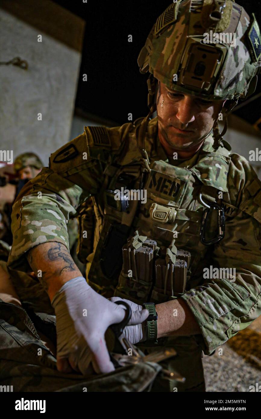 U.S. Army Spc. Grayson Smith, a combat medic assigned to the 208th ...