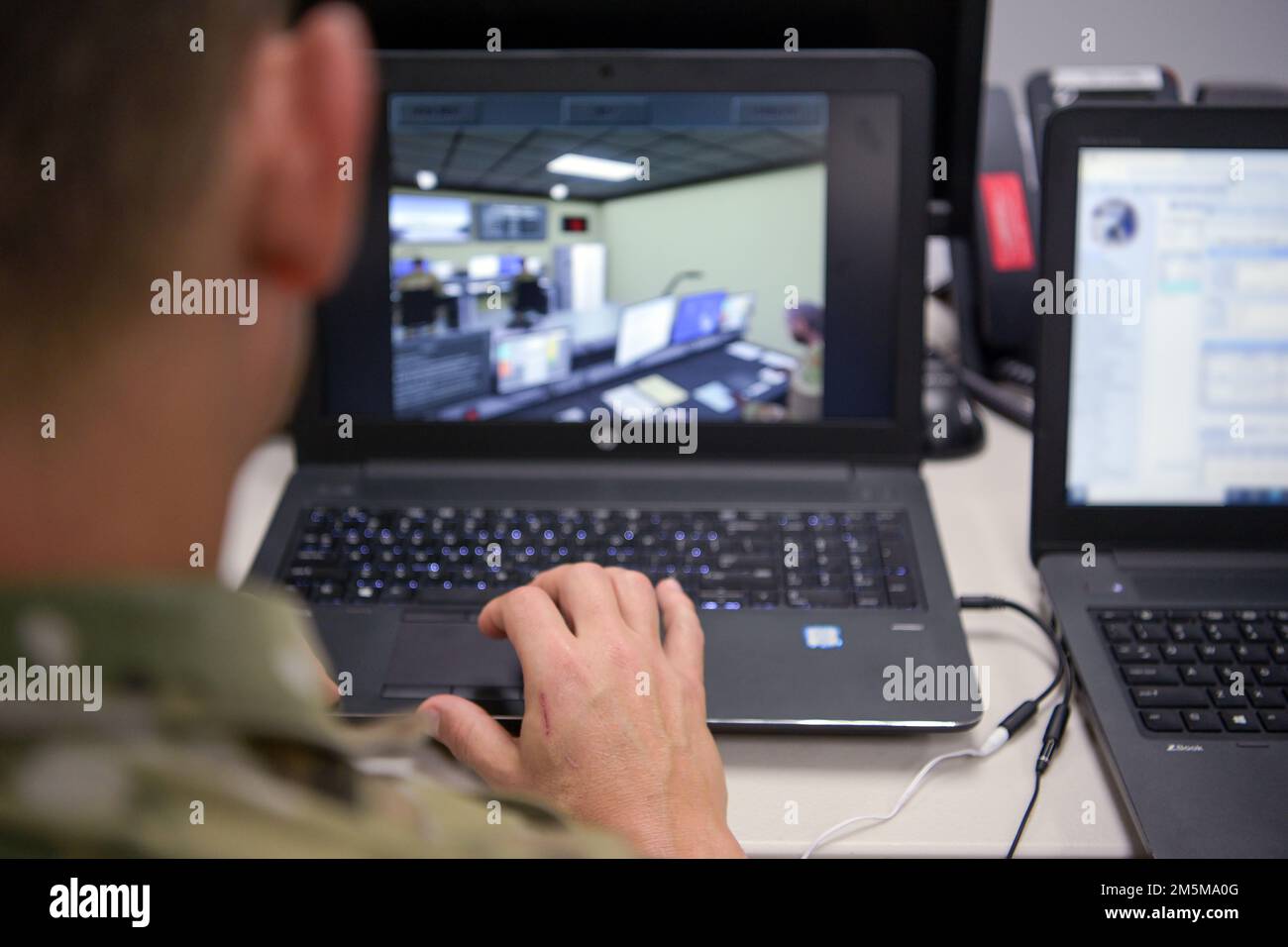 U.S. Air Force Airman with the 156th Contingency Response Group, inputs ...