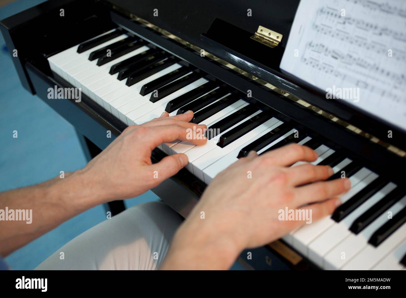 The piano's hand Stock Photo - Alamy