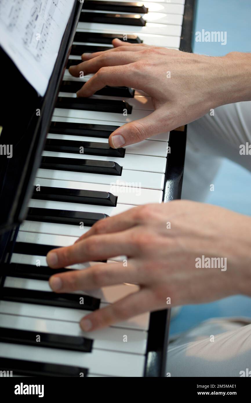 The piano's hand Stock Photo - Alamy