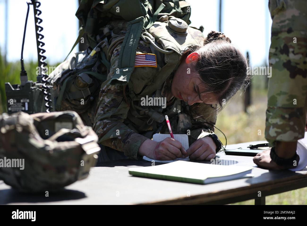 Spc. Cyan Rodriguez notates directives during the Army Warrior Task ...
