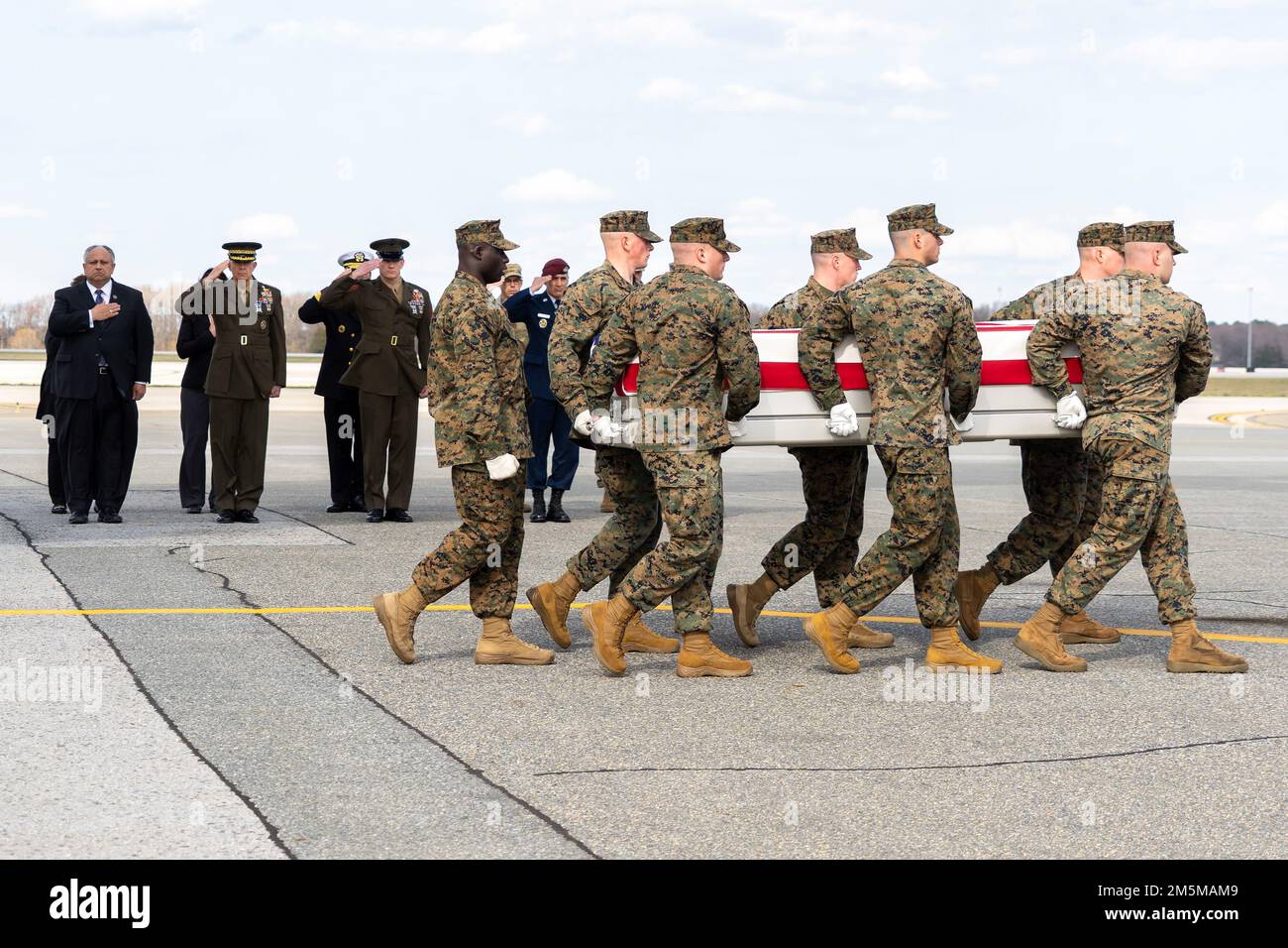 A U.S. Marine Corps carry team transfers the remains of Marine Capt ...
