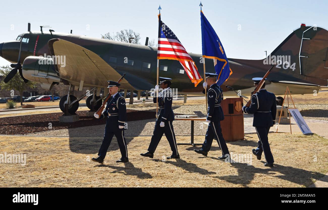 Service members assigned to the 17th Training Wing post the colors ...