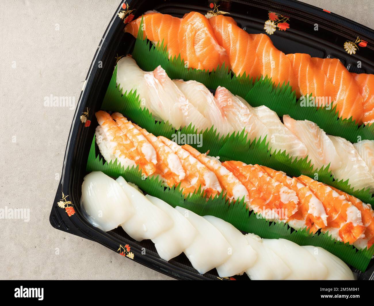 Various types of packaged sushi Stock Photo - Alamy