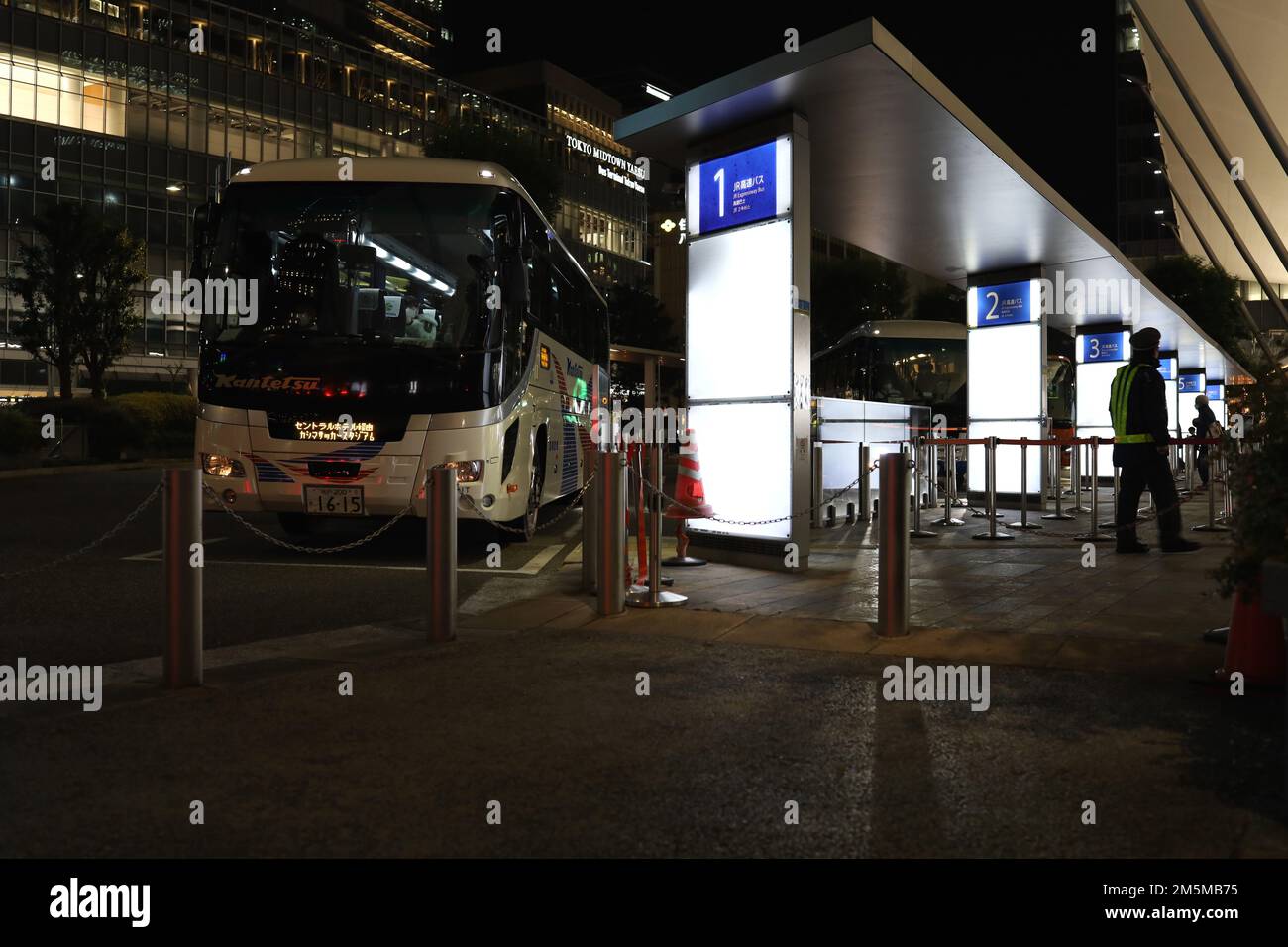Chiyoda Ward, Tokyo, Japan, December 2022.People waiting for a highway ...