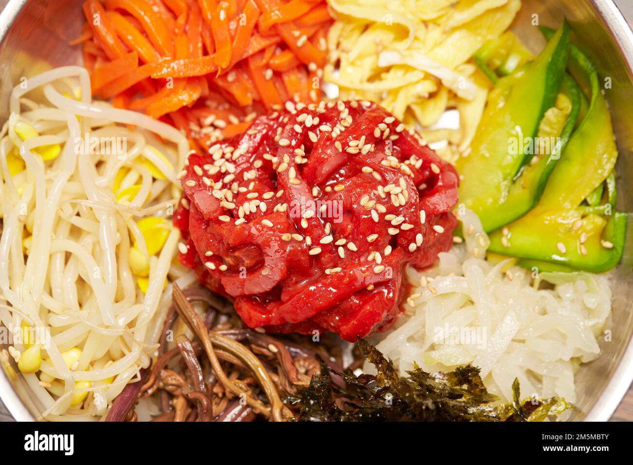 Beef Tartare Bibimbap, Yukhoe bibimbap Stock Photo - Alamy