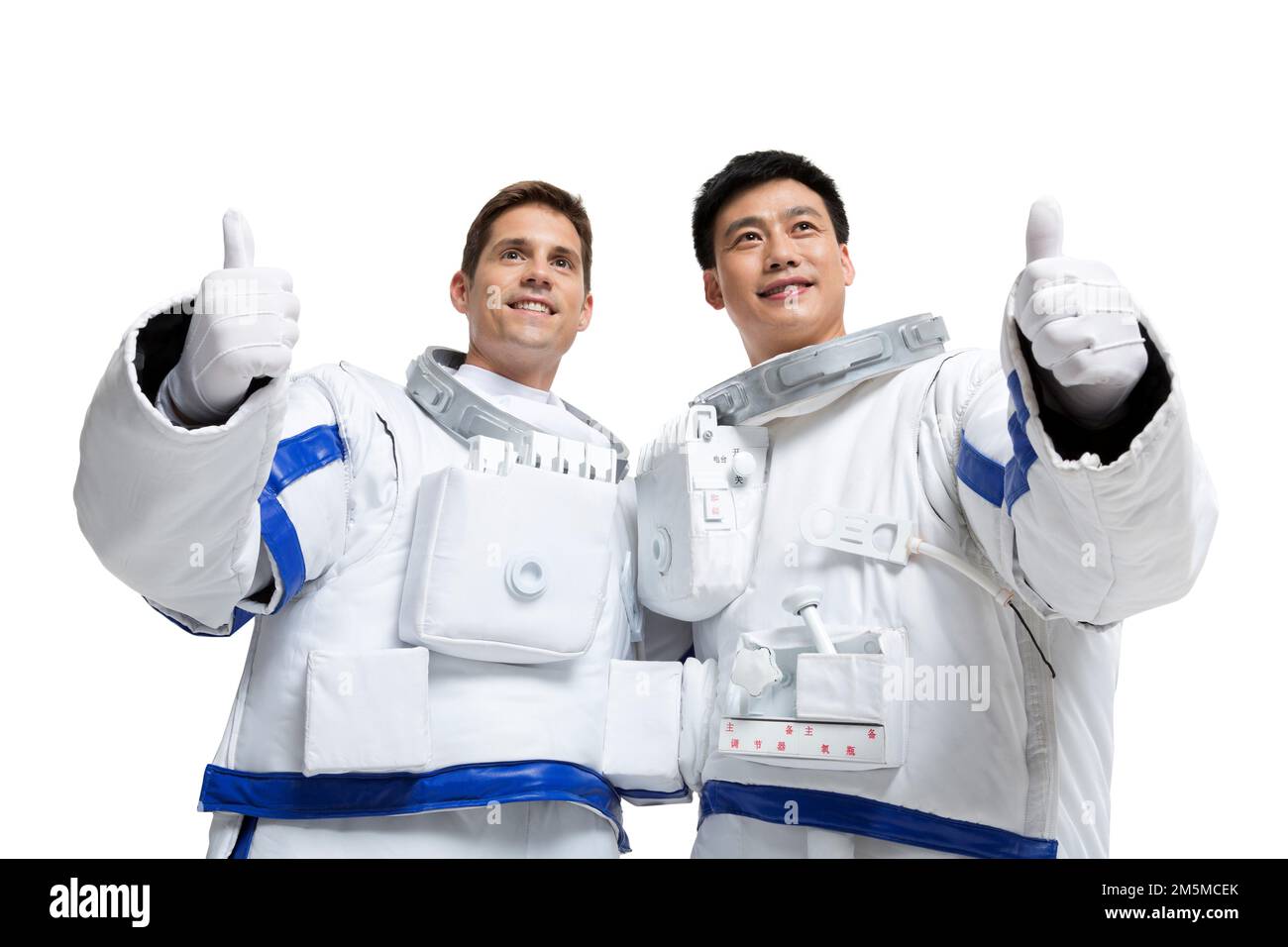 Two astronauts in space suits hi-res stock photography and images - Alamy