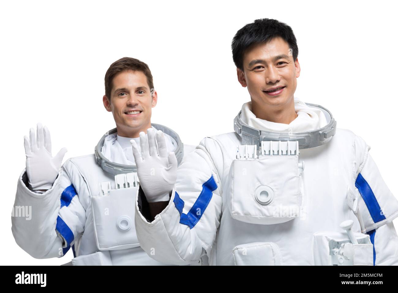 Two astronauts in space suits hi-res stock photography and images - Alamy