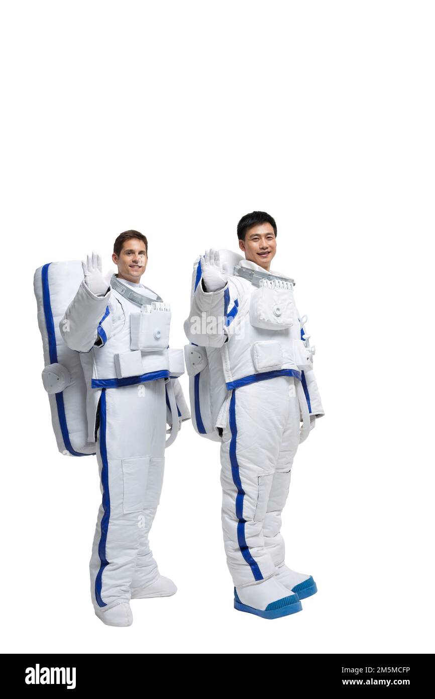 Two astronauts in space suits hi-res stock photography and images - Alamy