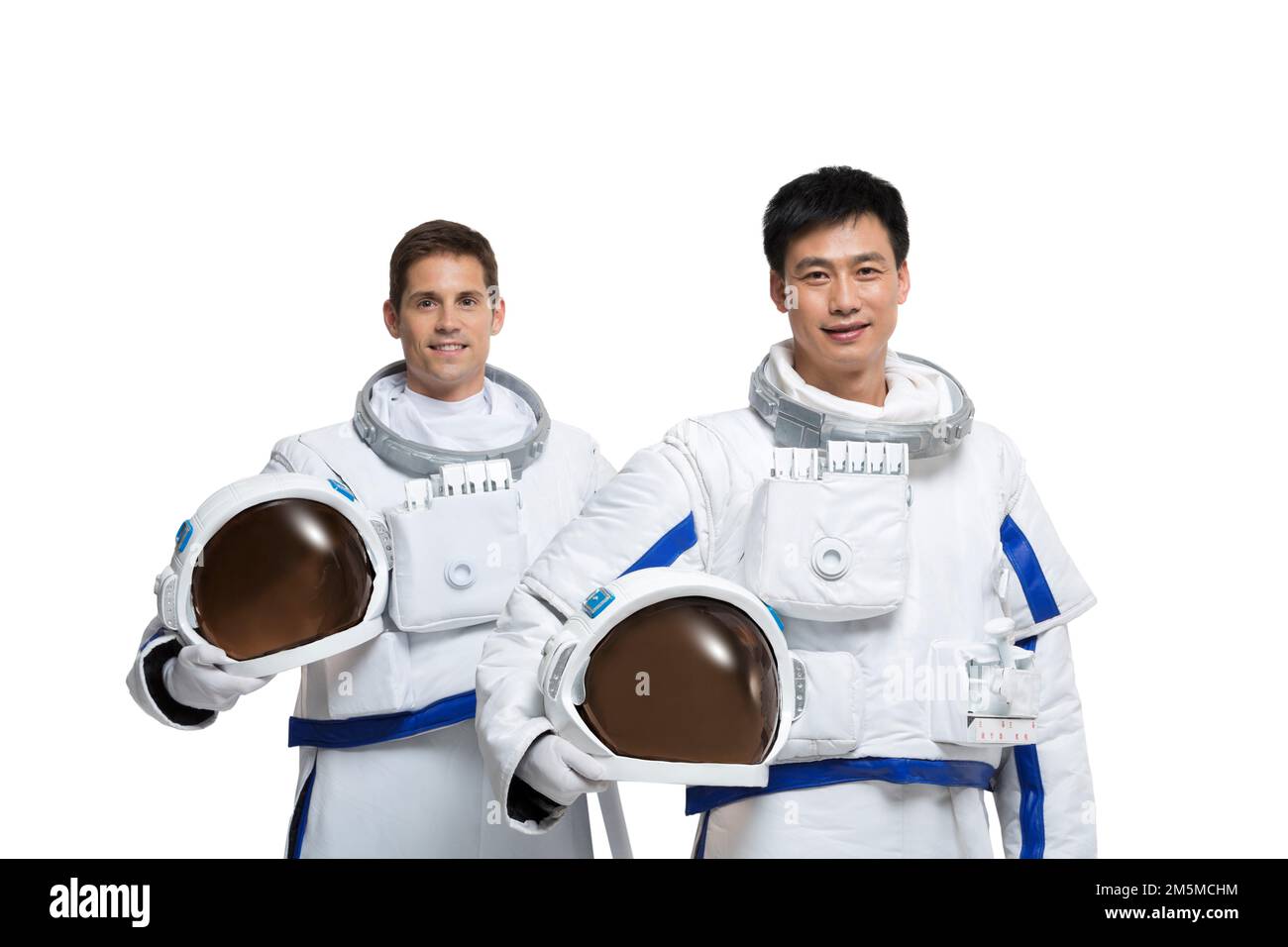 Two astronauts in space suits hi-res stock photography and images - Alamy