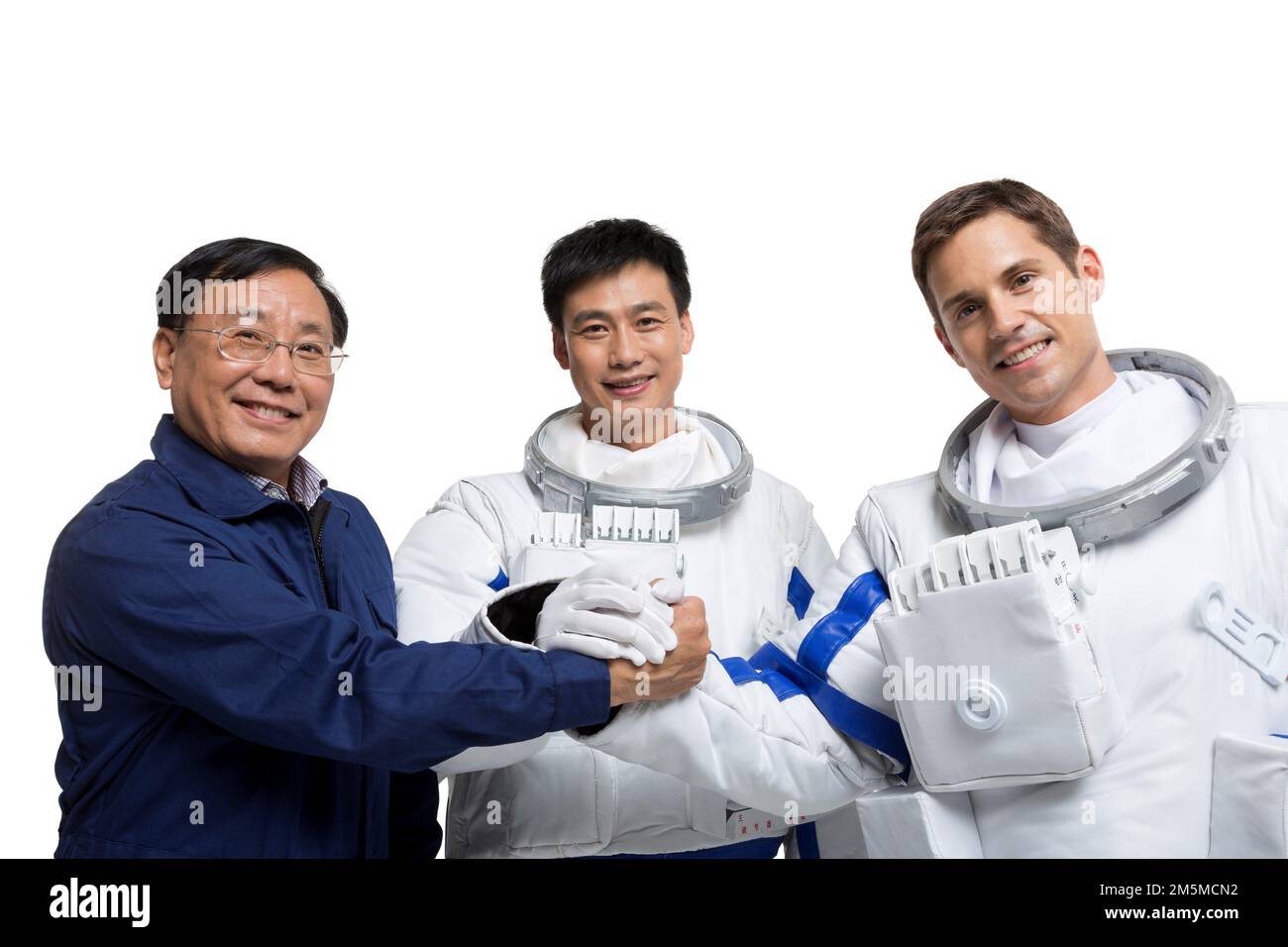 Photo shoot male astronauts and engineer team Stock Photo - Alamy