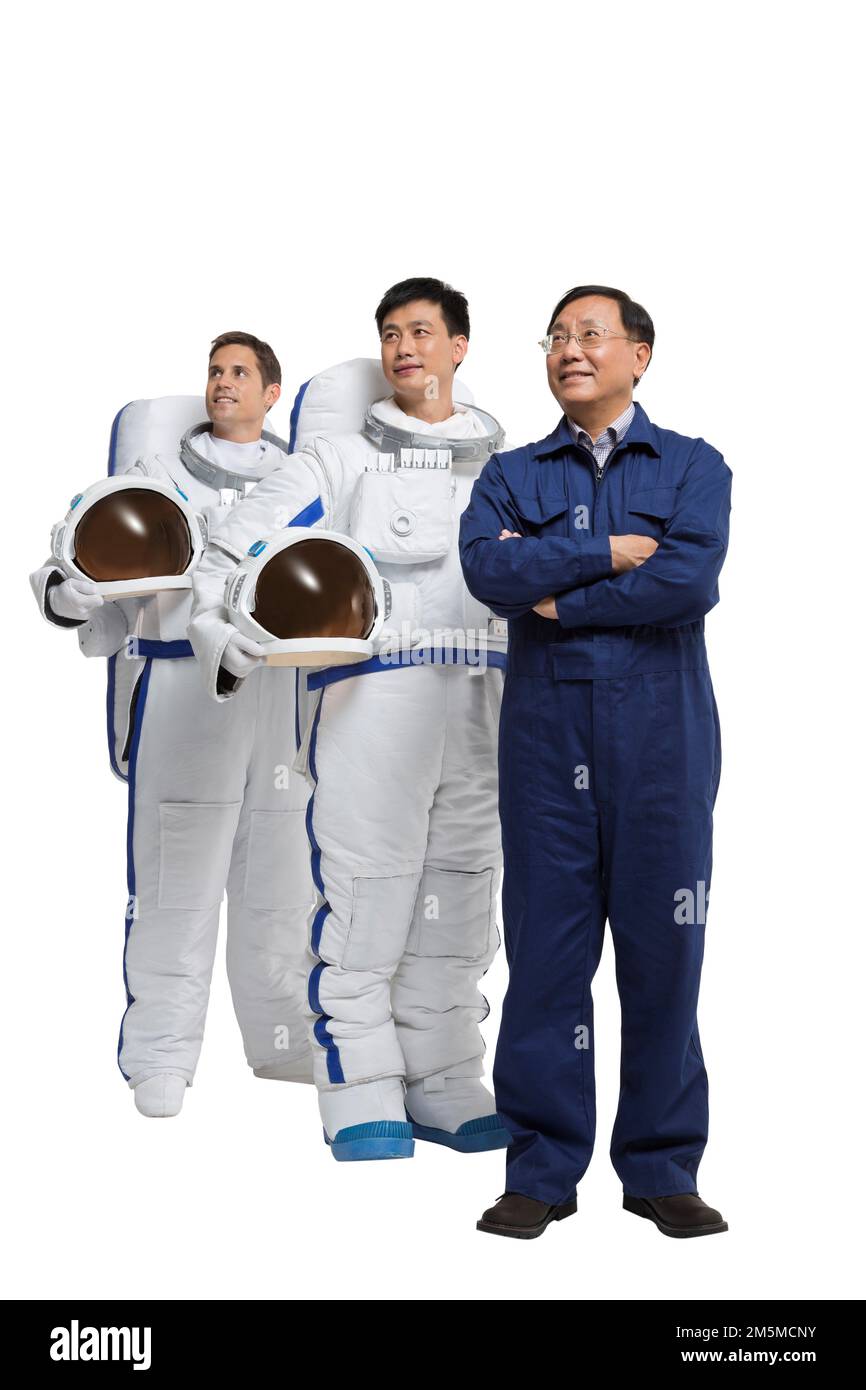 Photo shoot male astronauts and engineer team Stock Photo - Alamy