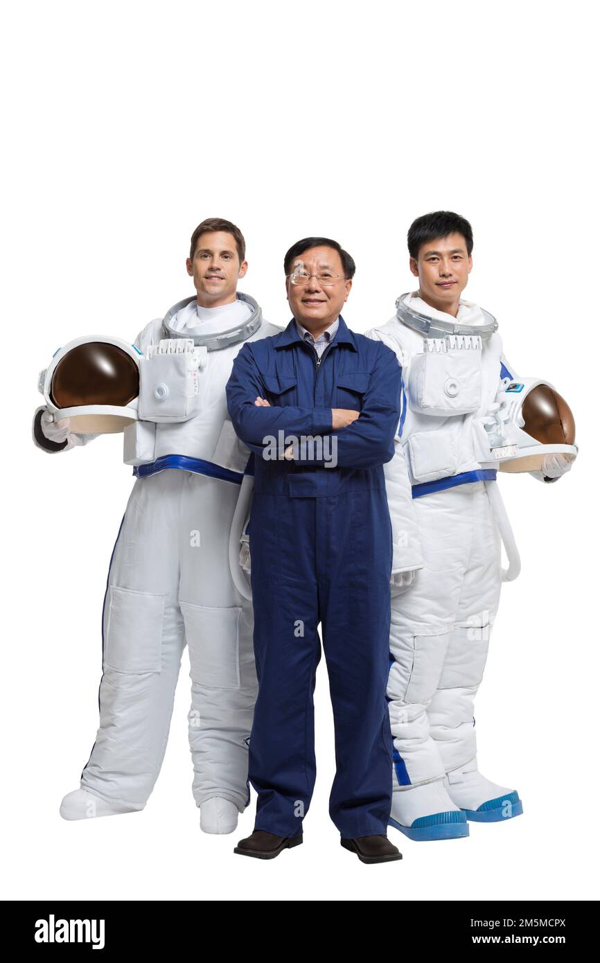 Photo shoot male astronauts and engineer team Stock Photo - Alamy