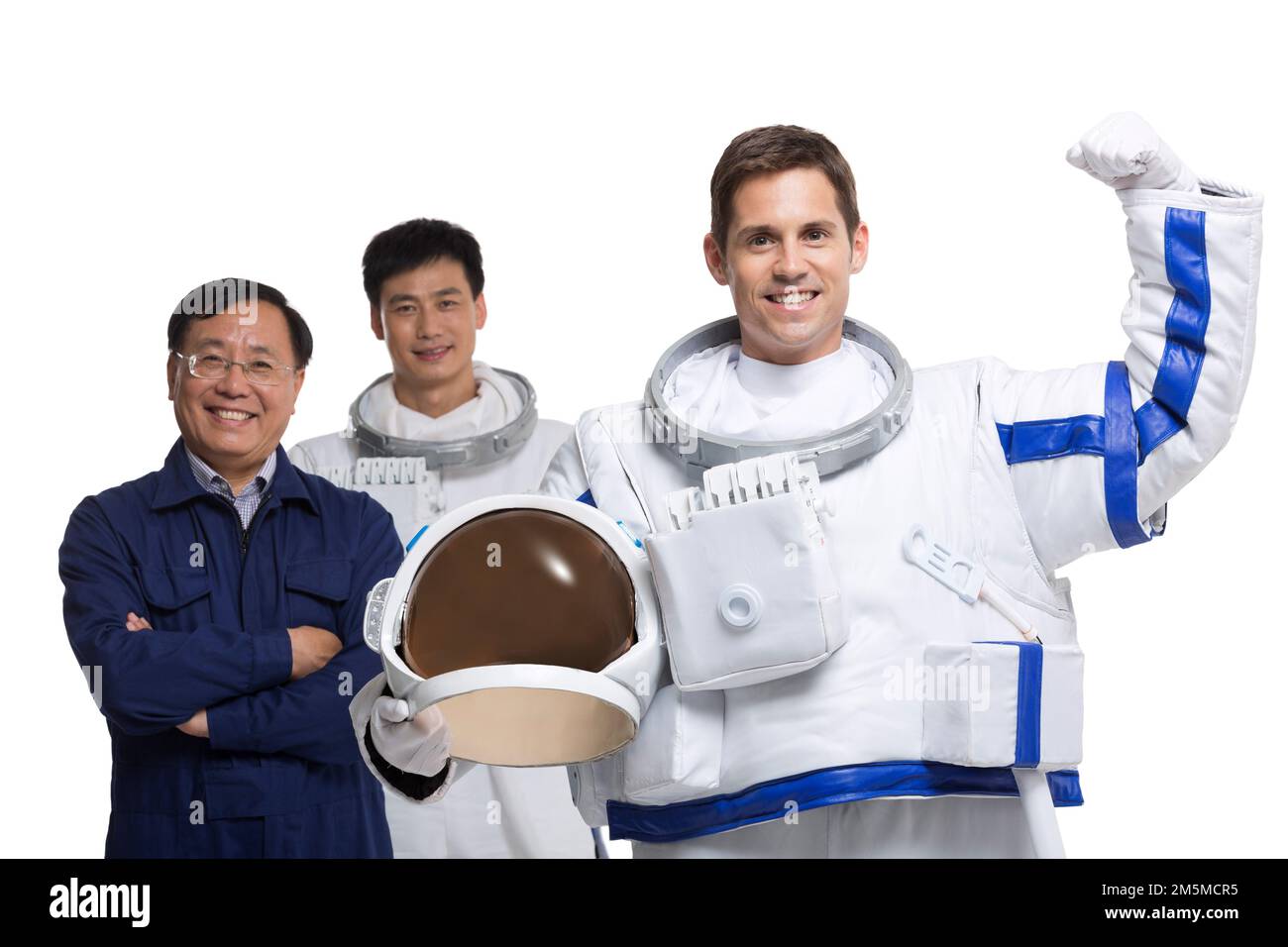 Photo shoot male astronauts and engineer team Stock Photo - Alamy