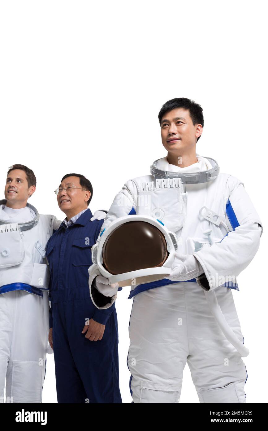 Photo shoot male astronauts and engineer team Stock Photo - Alamy