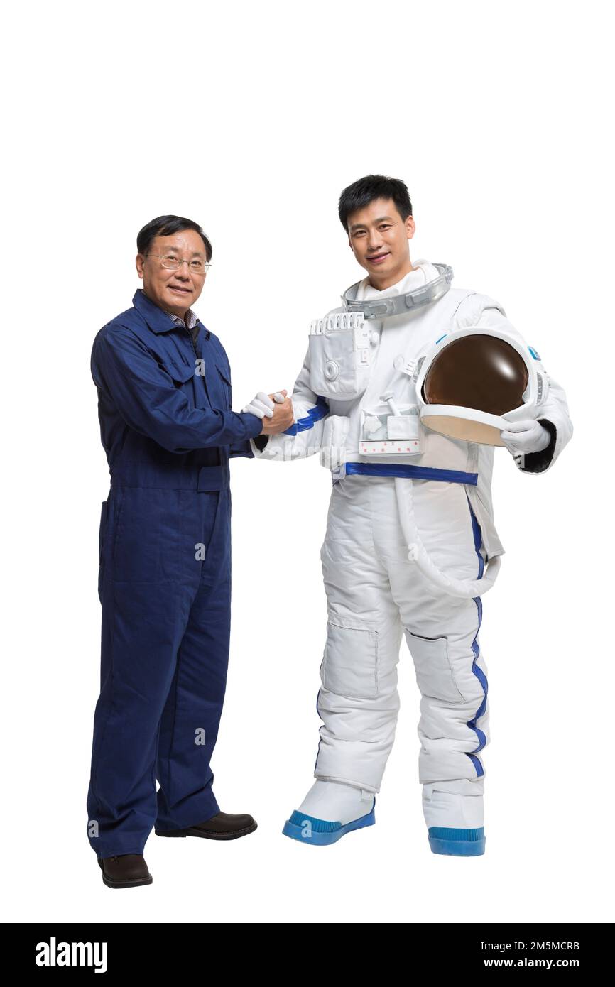 Photo shoot male astronauts and engineer team Stock Photo - Alamy