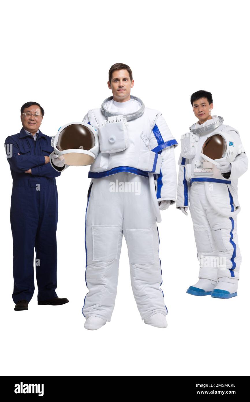 Photo shoot male astronauts and engineer team Stock Photo - Alamy