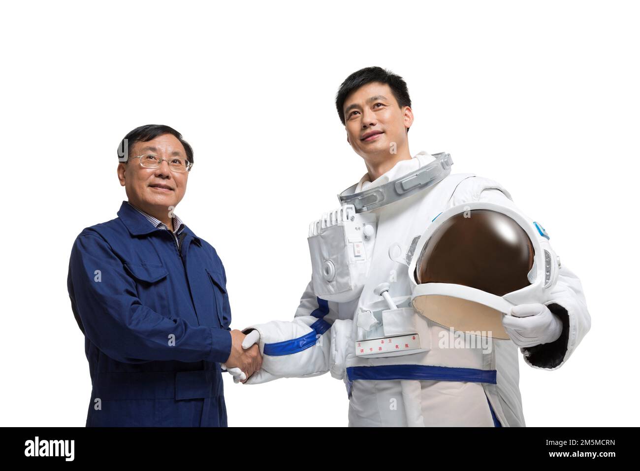 Photo shoot male astronauts and engineer team Stock Photo - Alamy