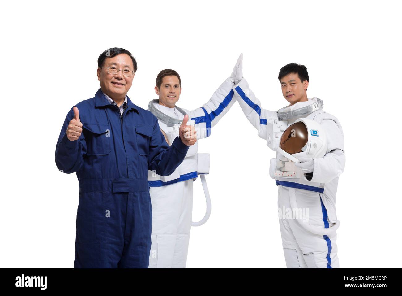 Photo shoot male astronauts and engineer team Stock Photo - Alamy