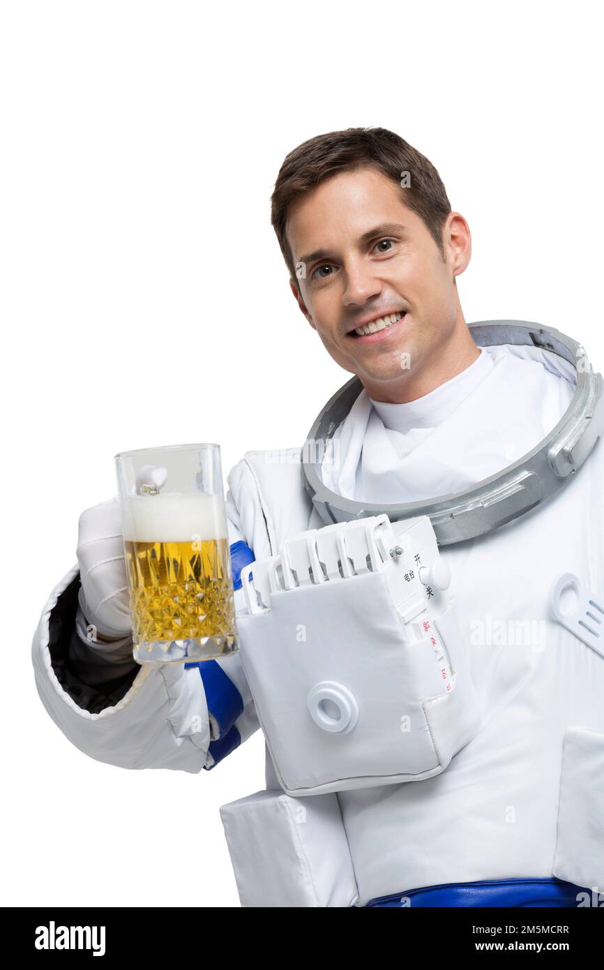 Shed male astronauts drink beer to celebrate Stock Photo - Alamy