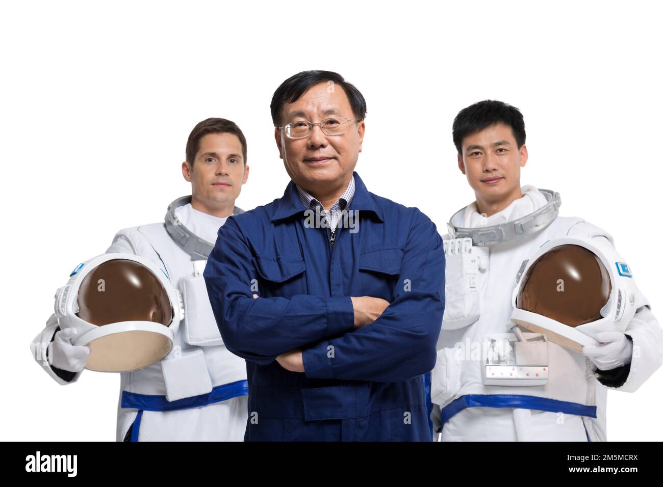 Photo shoot male astronauts and engineer team Stock Photo - Alamy