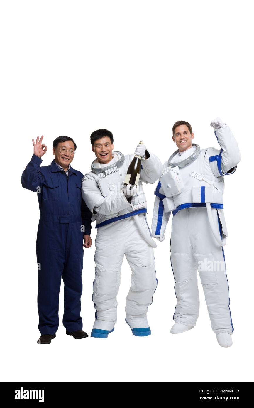 Photo shoot male astronauts and engineer team Stock Photo - Alamy