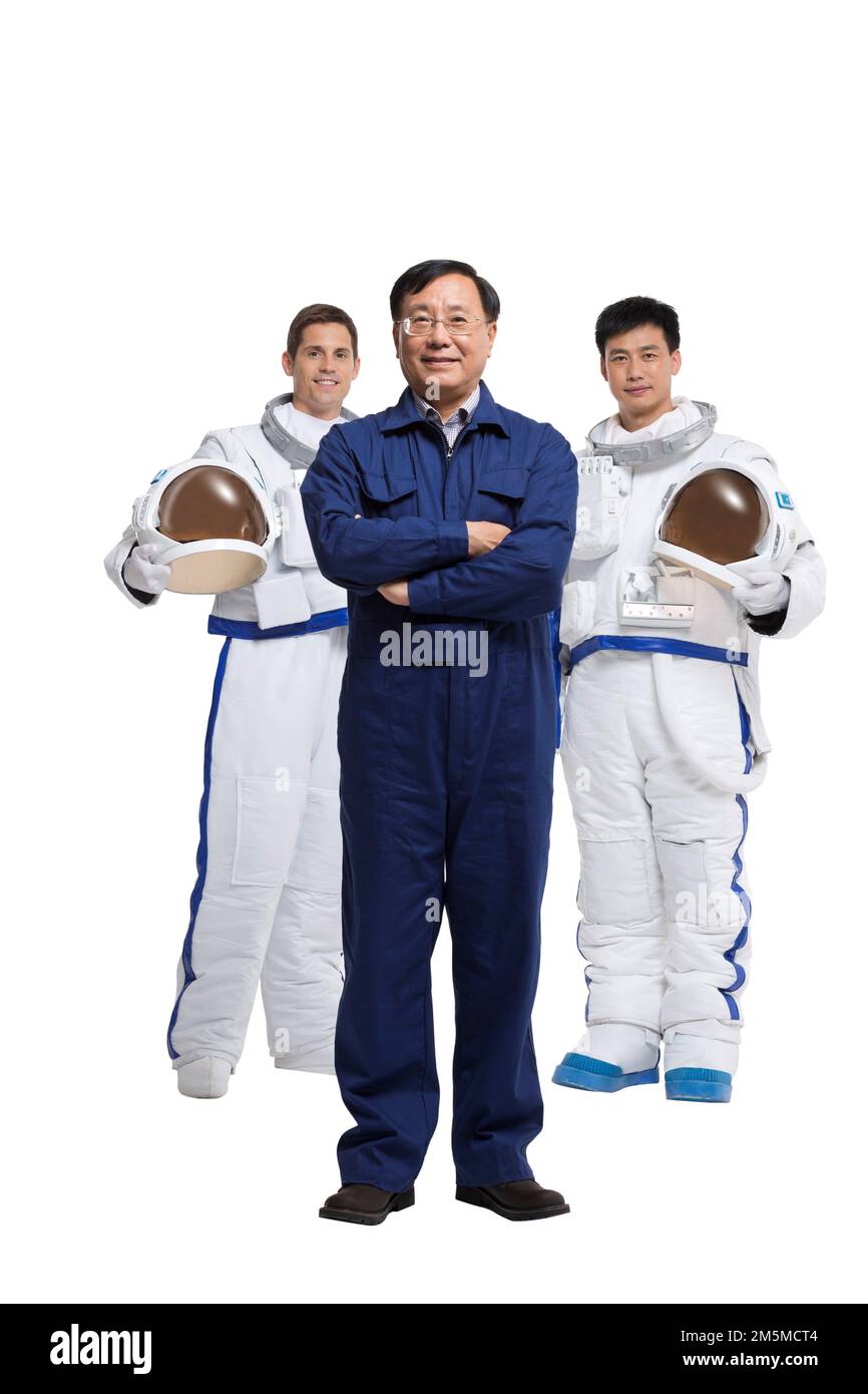 Photo shoot male astronauts and engineer team Stock Photo - Alamy