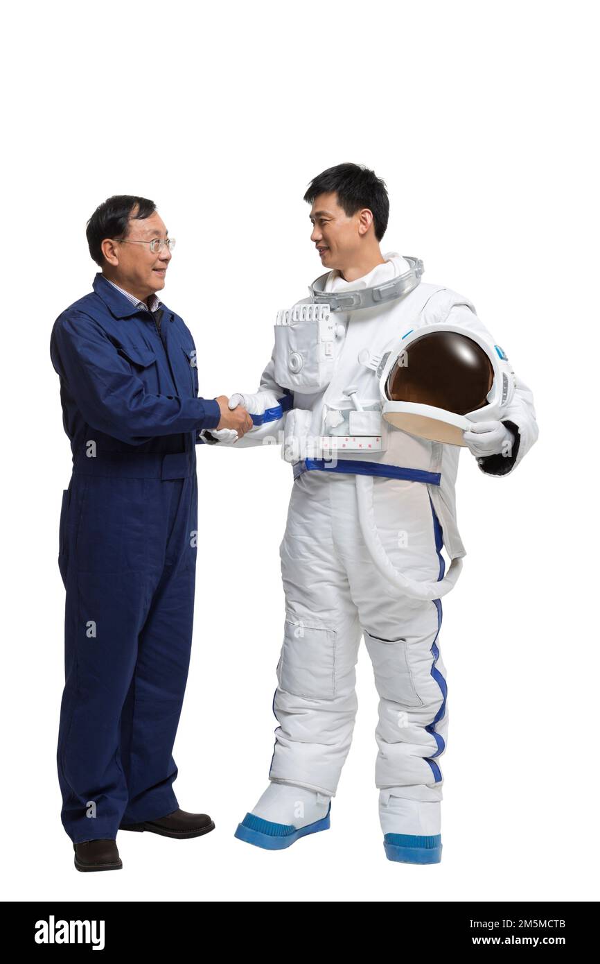 Photo shoot male astronauts and engineer team Stock Photo - Alamy