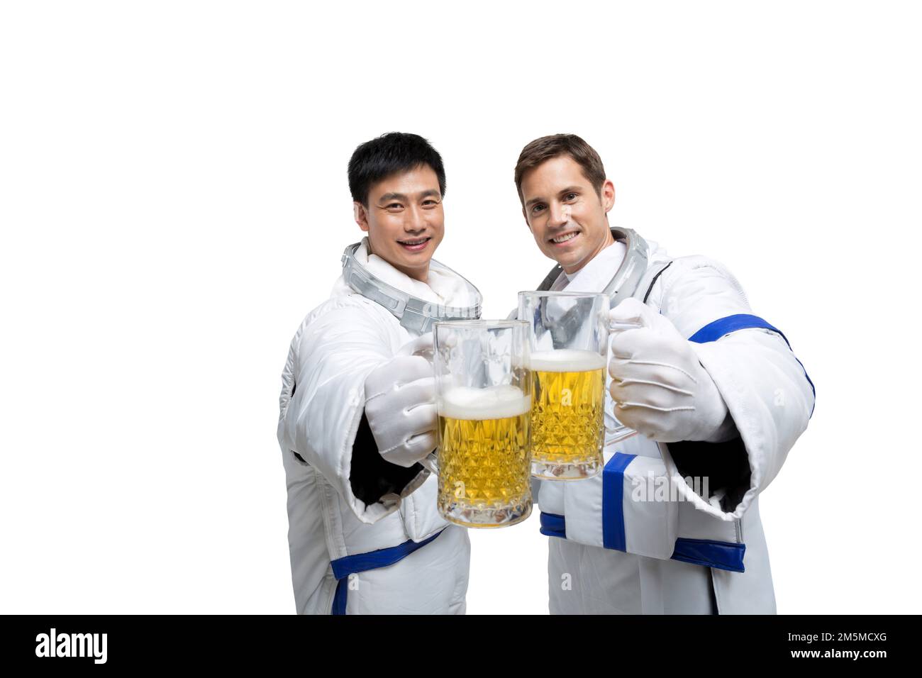 Shed male astronauts drink beer to celebrate Stock Photo - Alamy