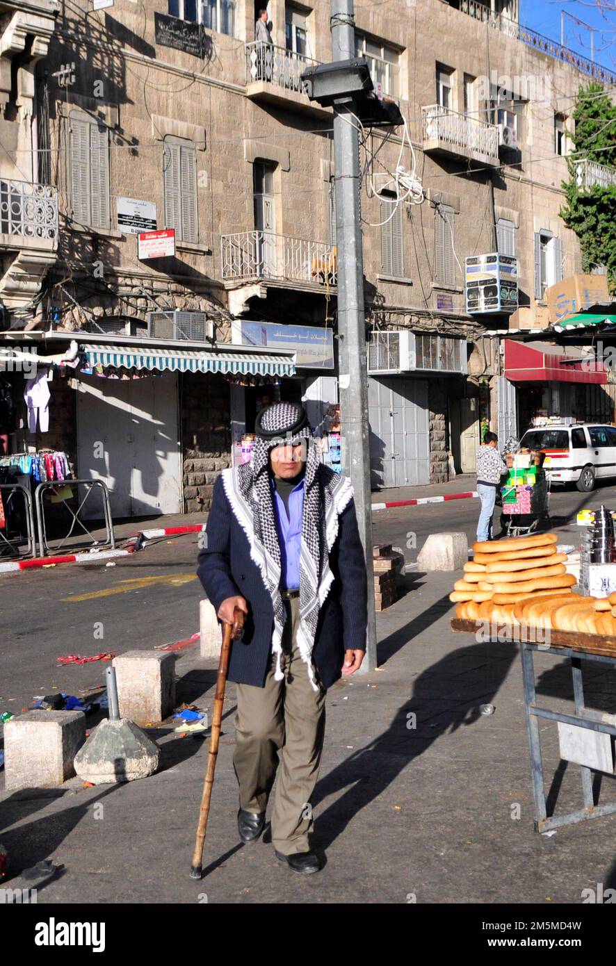 A Palestinian man wearing a traditional Kaffia on his head. Photo taken ...