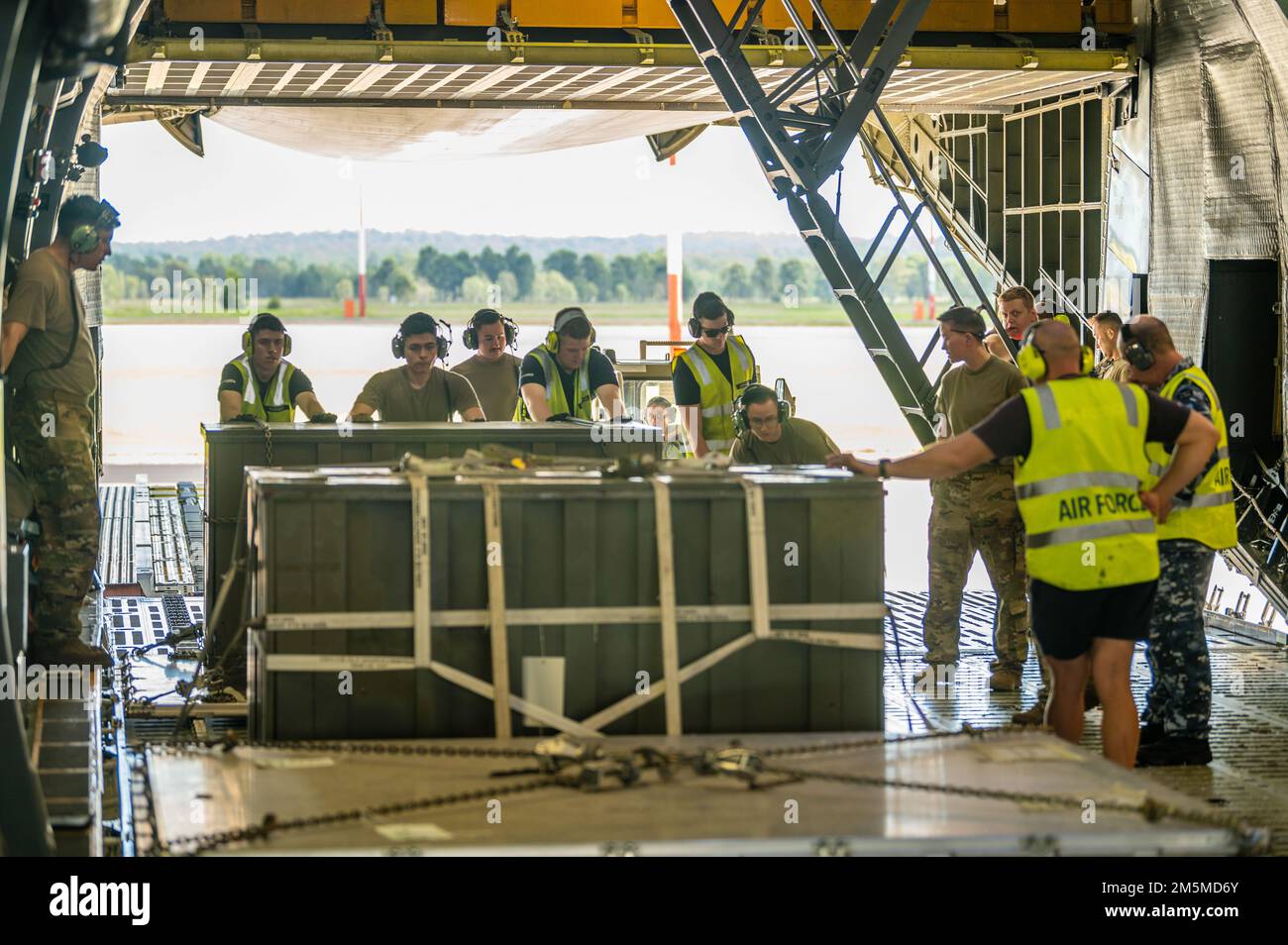 Airmen assigned to the 22nd Airlift Squadron at Travis Air Force Base ...
