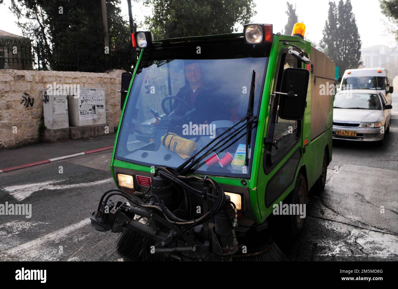A street cleaning vehicle cleaning the streets of Jerusalem, Israel ...